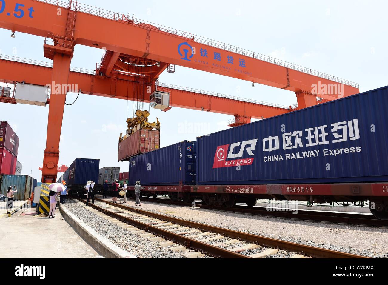 A container is being lifted from the first freight train X8074 of China ...