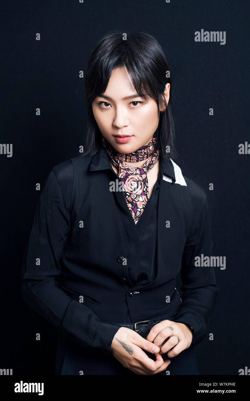 Chinese singer Zhou Bichang poses for portrait photos during an ...