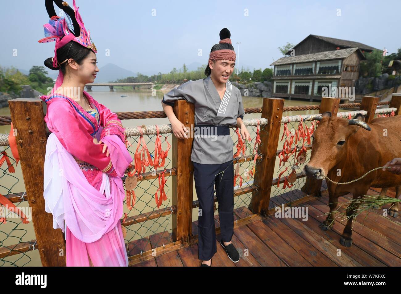 Chinese young people dressed in traditional costumes reshow the legend ...