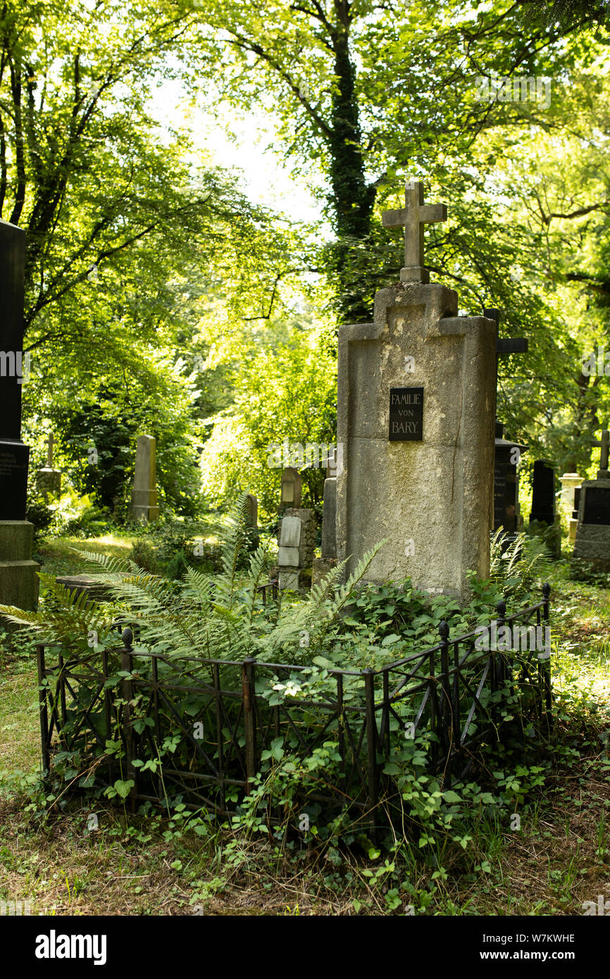 An old tombstone in the Alter Südfriedhof cemetery in the ...