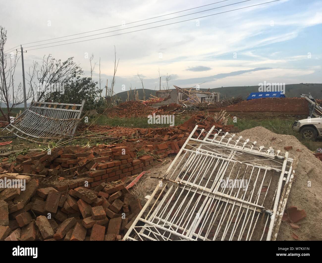 View of debris of a house after a cyclone swept through Ongniud Banner ...