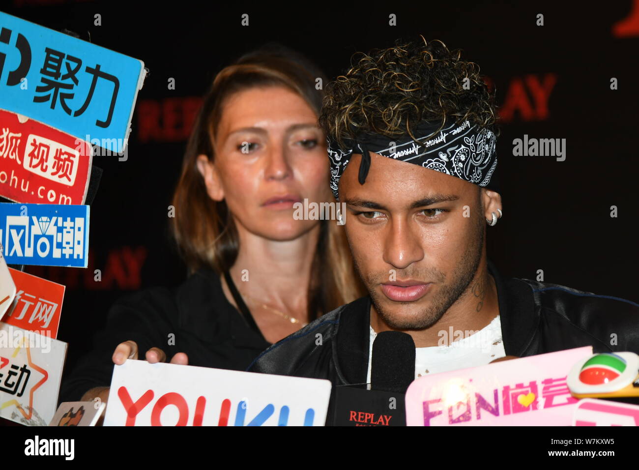 Brazilian football star Neymar, or Neymar Jr., attends the fashion show ...
