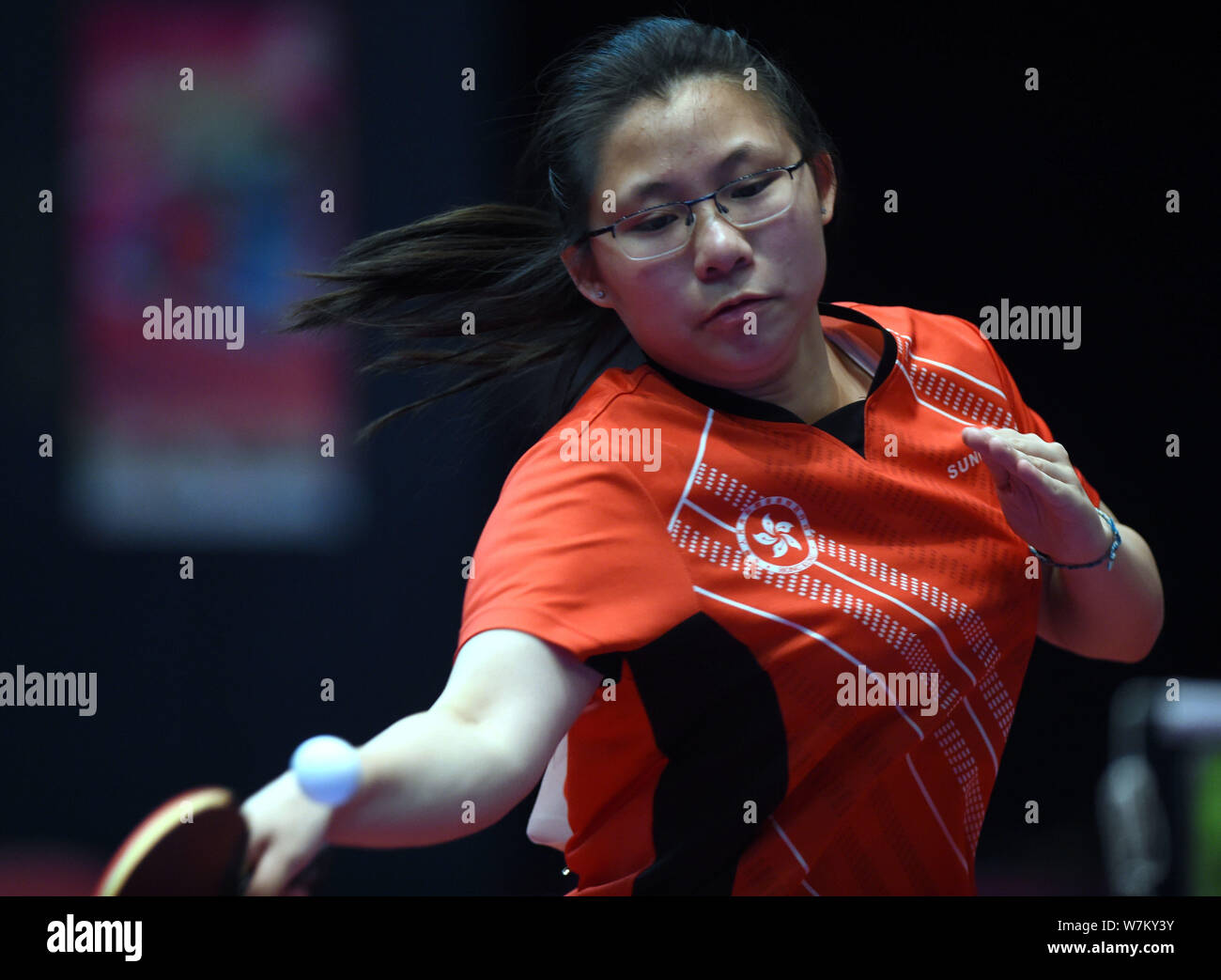 Lee Ka Yee of Hong Kong returns a shot as she and Ng Wing Lam compete ...