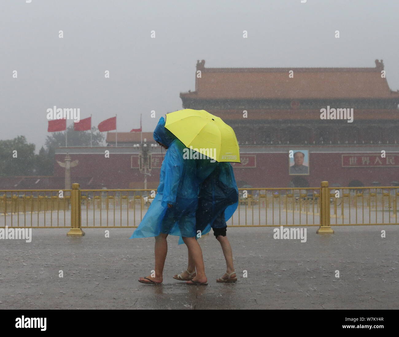 Rain coats hi-res stock photography and images - Alamy