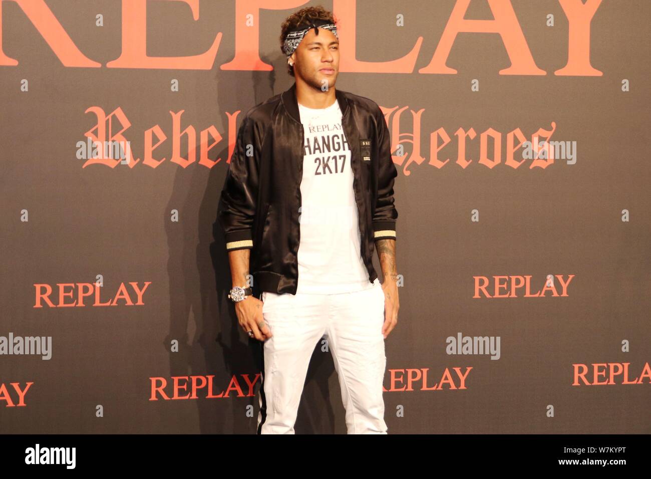 Brazilian football star Neymar, or Neymar Jr., poses as he arrives at ...