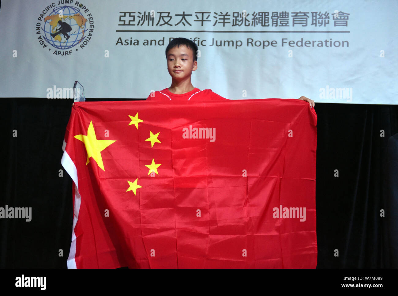 Cen Xiaolin, a 13-year-old boy from south China's Guangdong, poses with ...