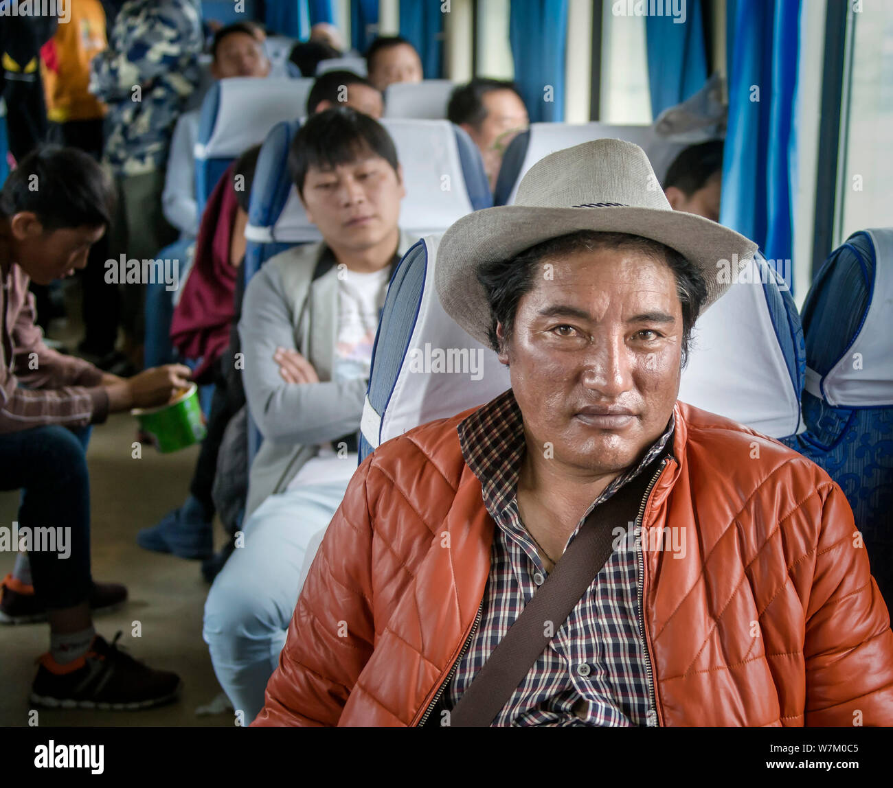 Passengers are pictured on a train running from Xining to Lhasa on the ...
