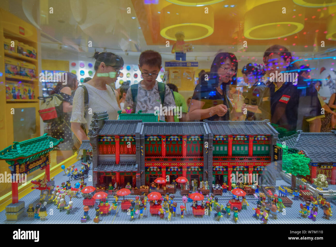 Visitors look at the LEGO sculpture of Guwenhua Jie, Tianjin's Ancient ...