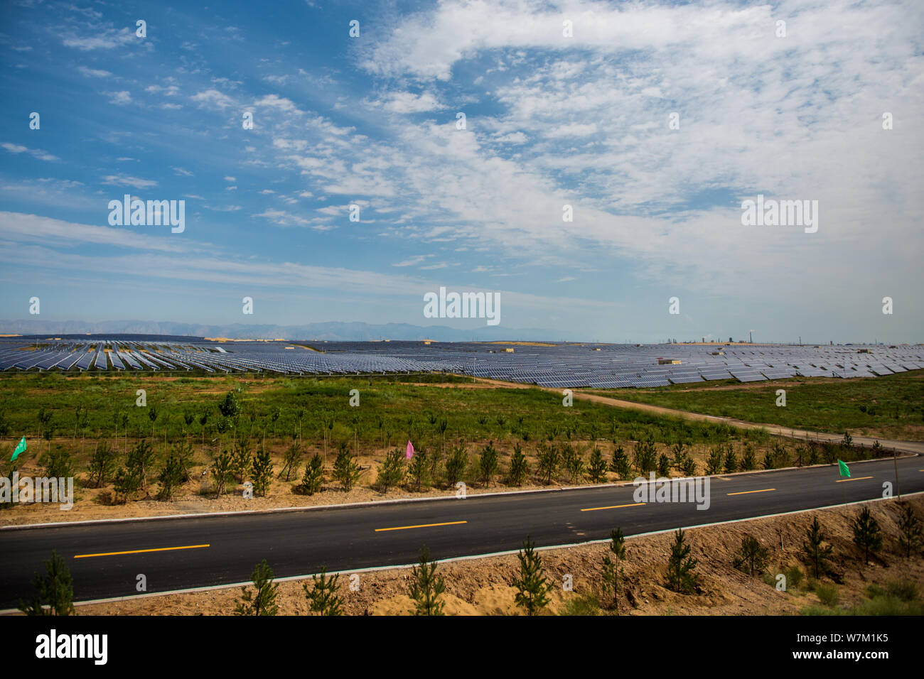 Solar panels are installed at a photovoltaic (PV) power plant of Elion ...