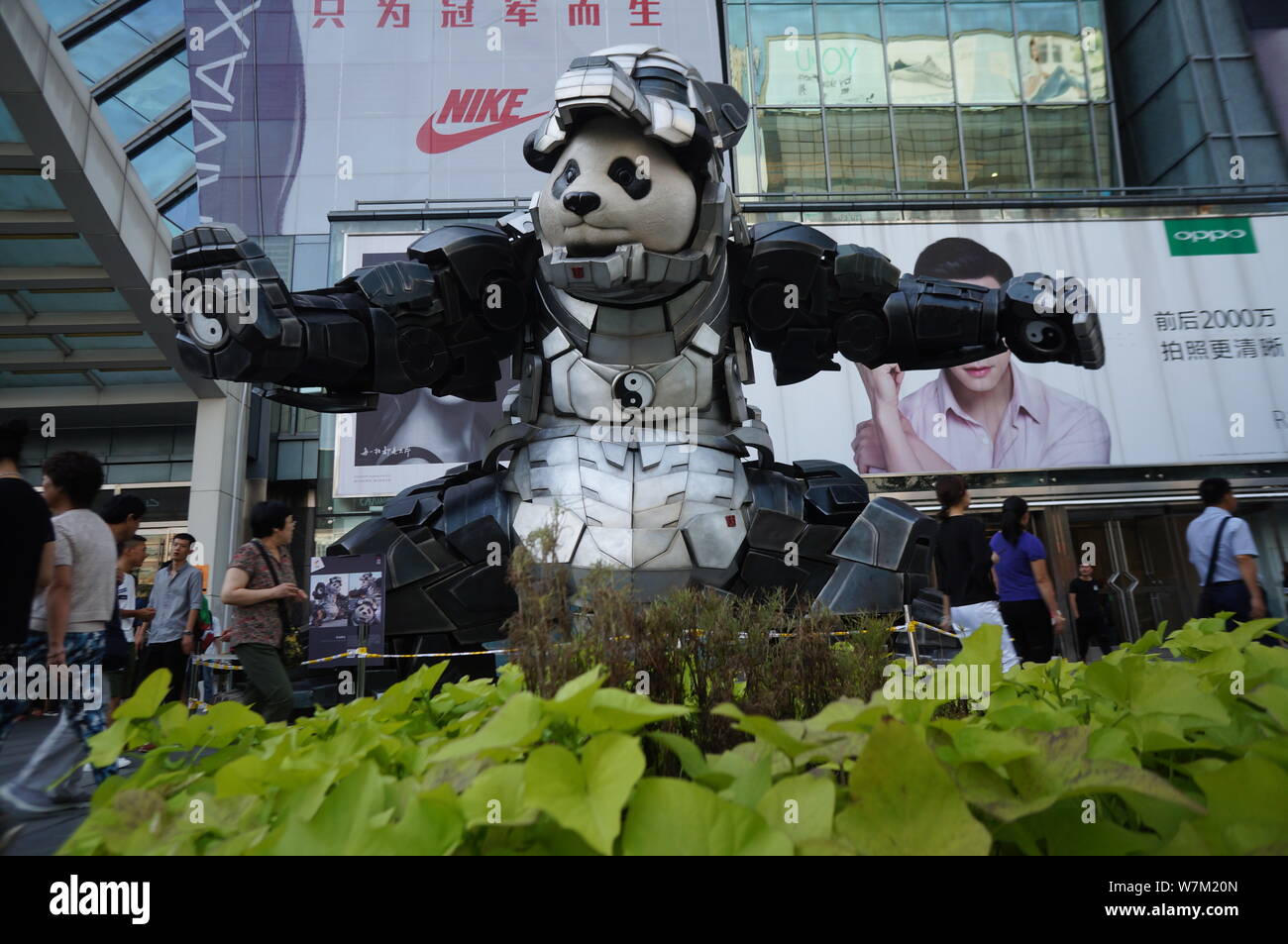 A Tai Chi panda sculpture is on display in front of a Joy City Shopping ...