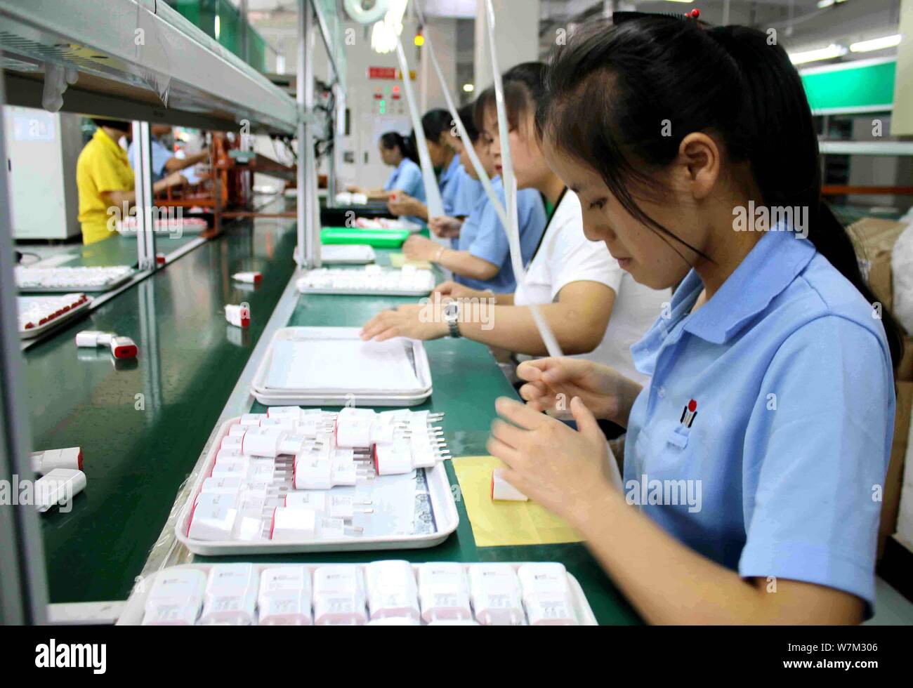 Female workers in manufacturing line hi-res stock photography and ...