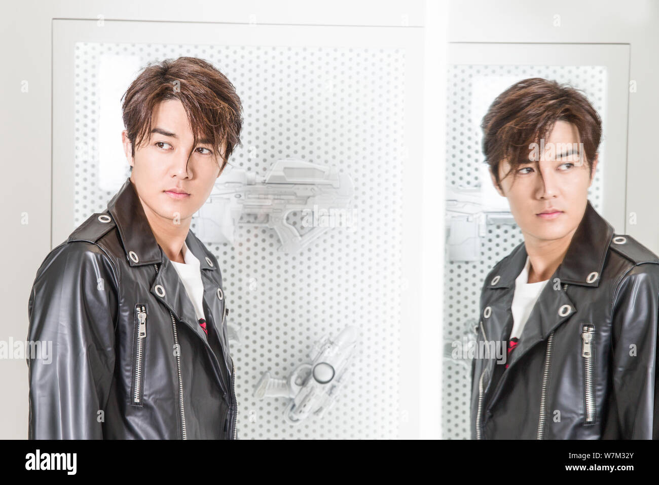 Taiwanese singer Kenji Wu poses for portrait photos during an exclusive ...