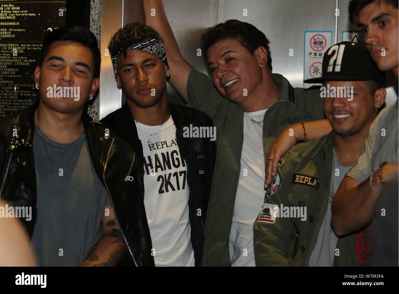 Brazilian football star Neymar, second left, or Neymar Jr., attends the ...