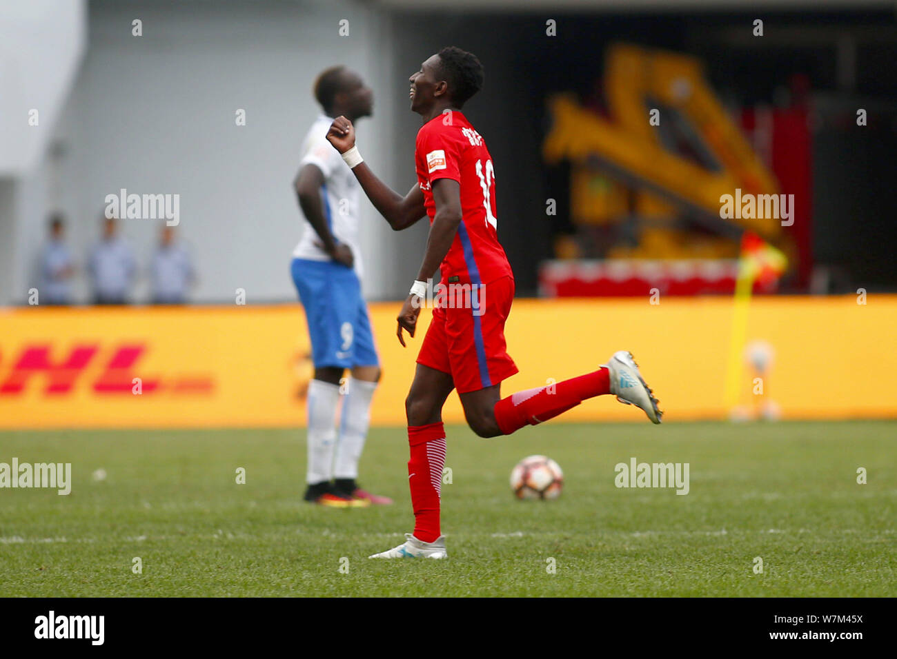 Gambian football player Bubacarr Trawally of Yanbian Funde celebrates ...