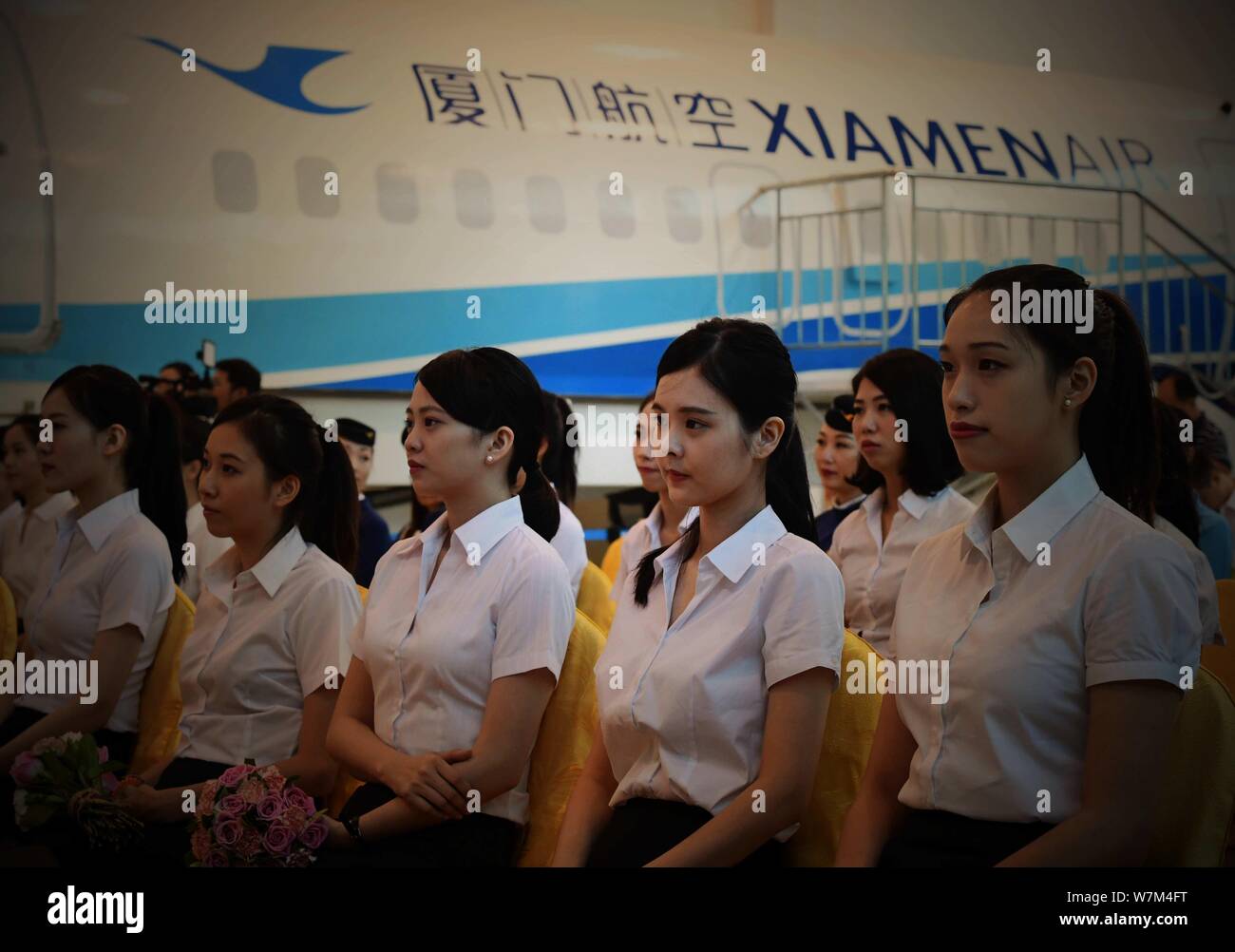 Air china cabin crew hi-res stock photography and images - Alamy