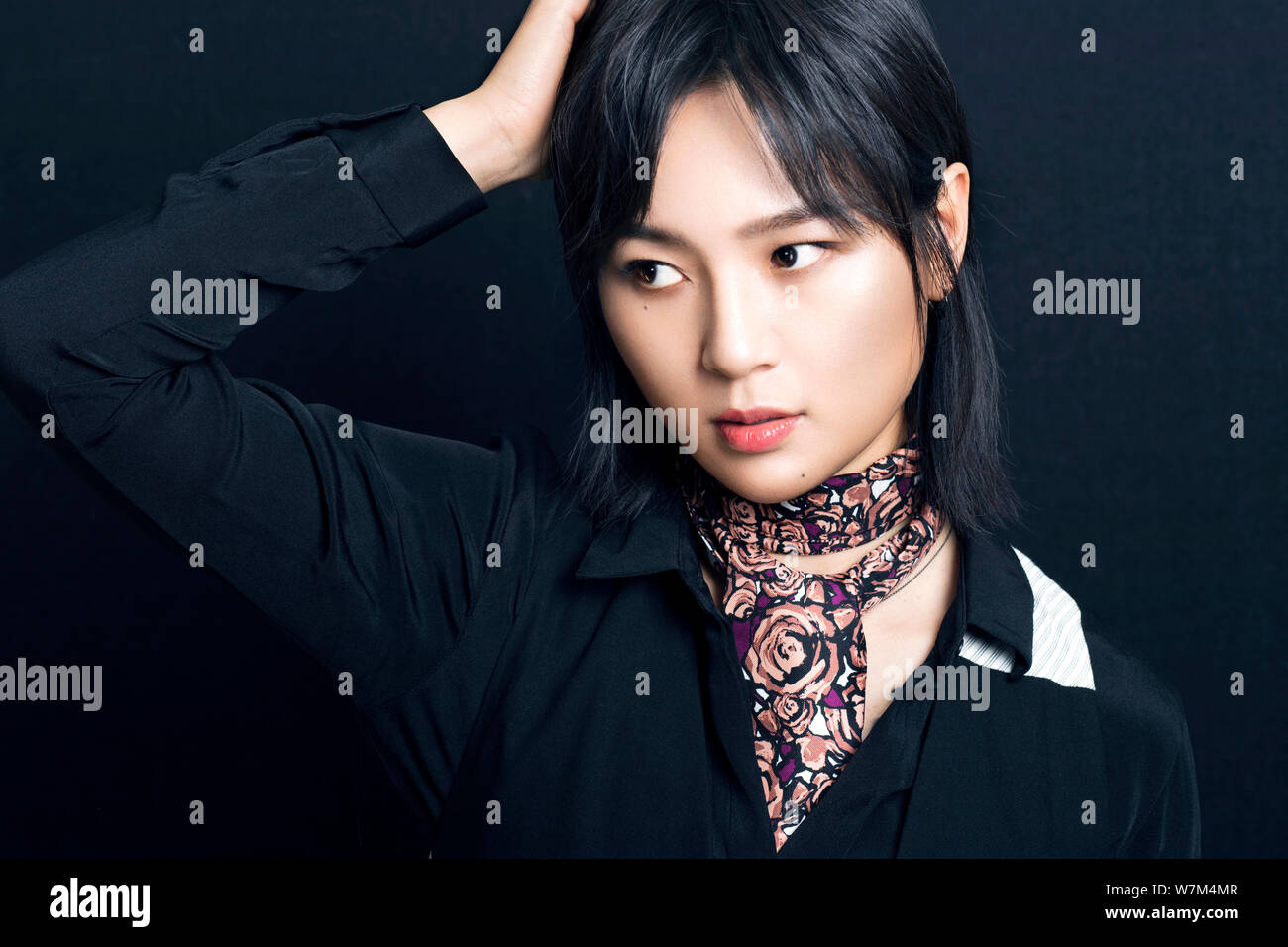 Chinese singer Zhou Bichang poses for portrait photos during an ...