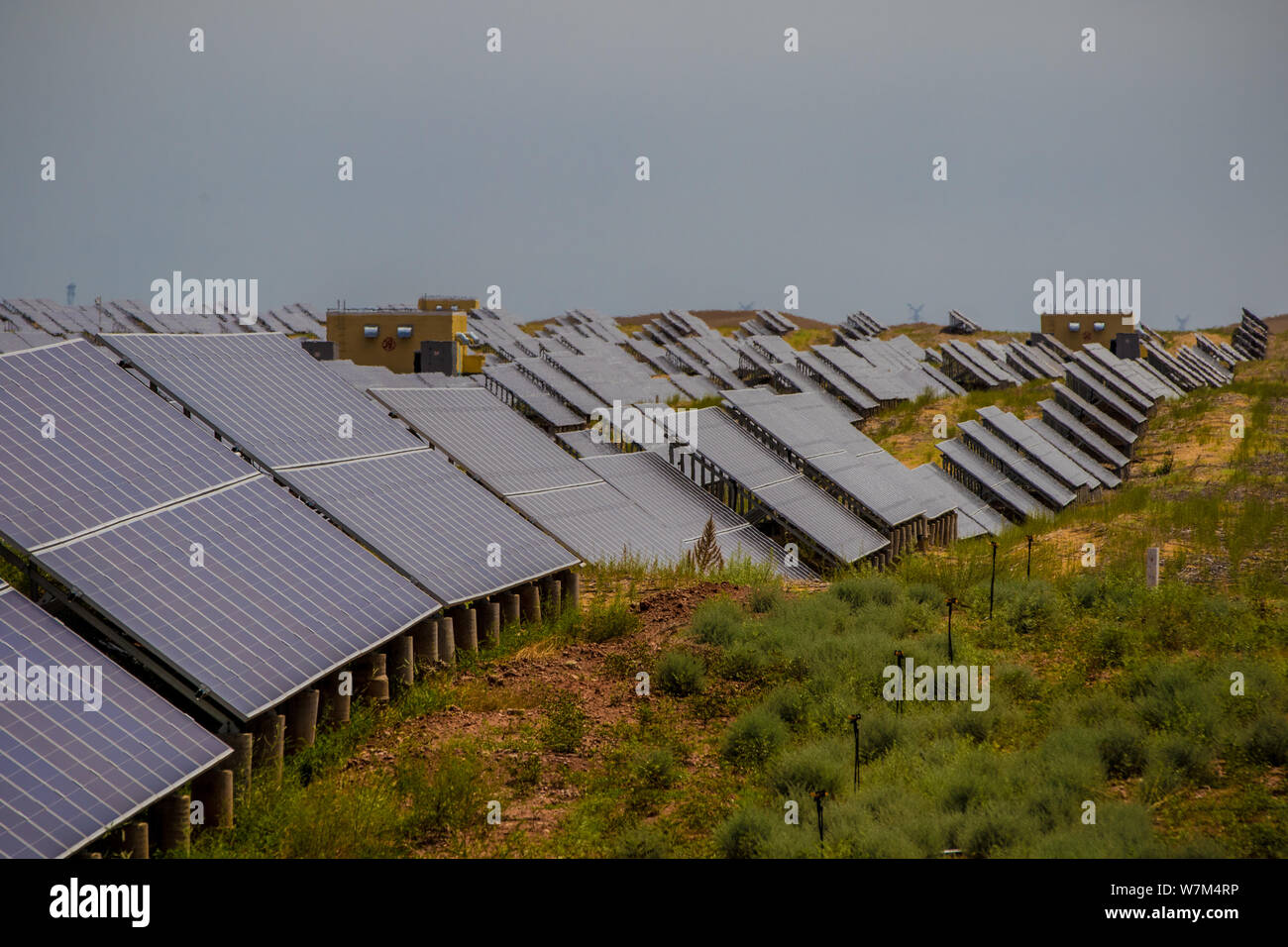 Solar panels are installed at a photovoltaic (PV) power plant of Elion ...
