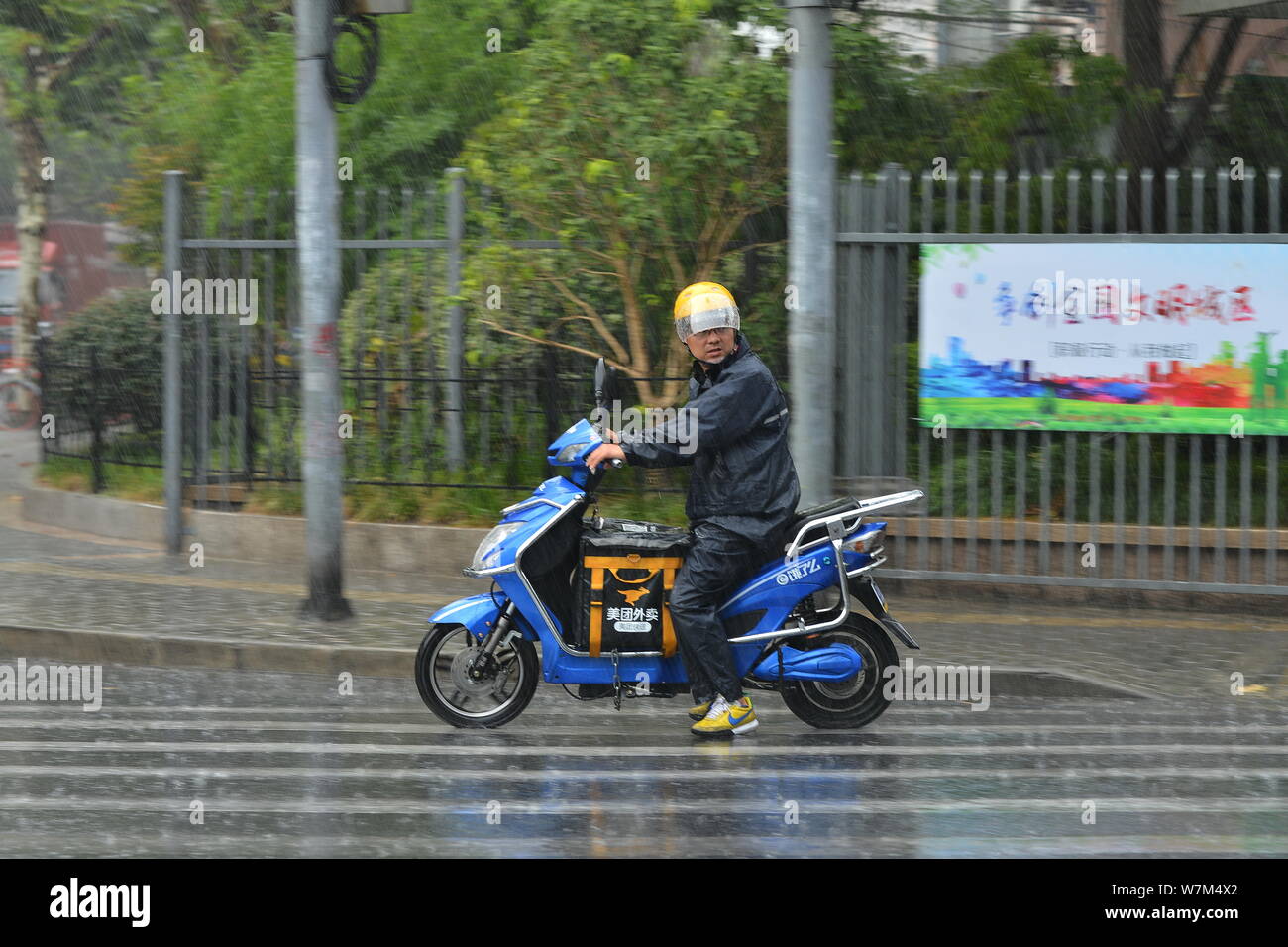 --FILE--A food delivery courier of Chinese online food delivery company ... --FILE--A food delivery courier of Chinese online food delivery company ...