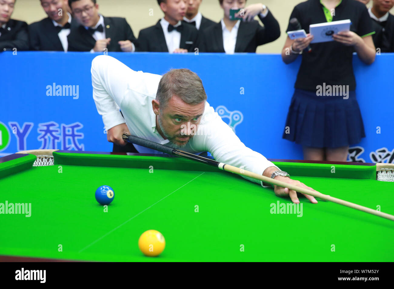 Retired Scottish snooker player Stephen Hendry plays a shot at the ...