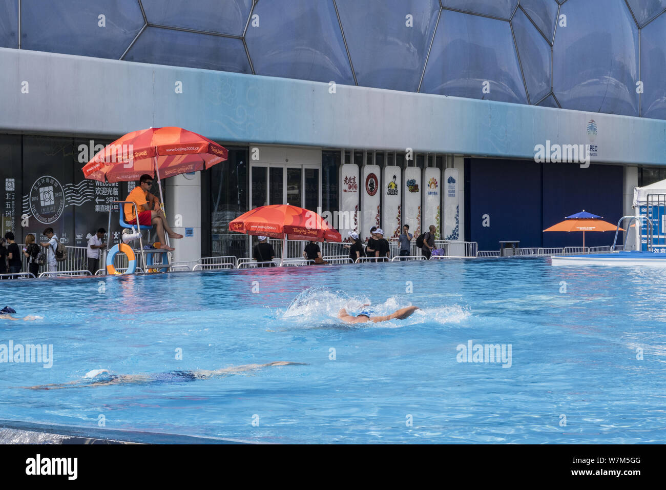 Local residents go swimming in the 25 meter-long and 15 meter-wide ...