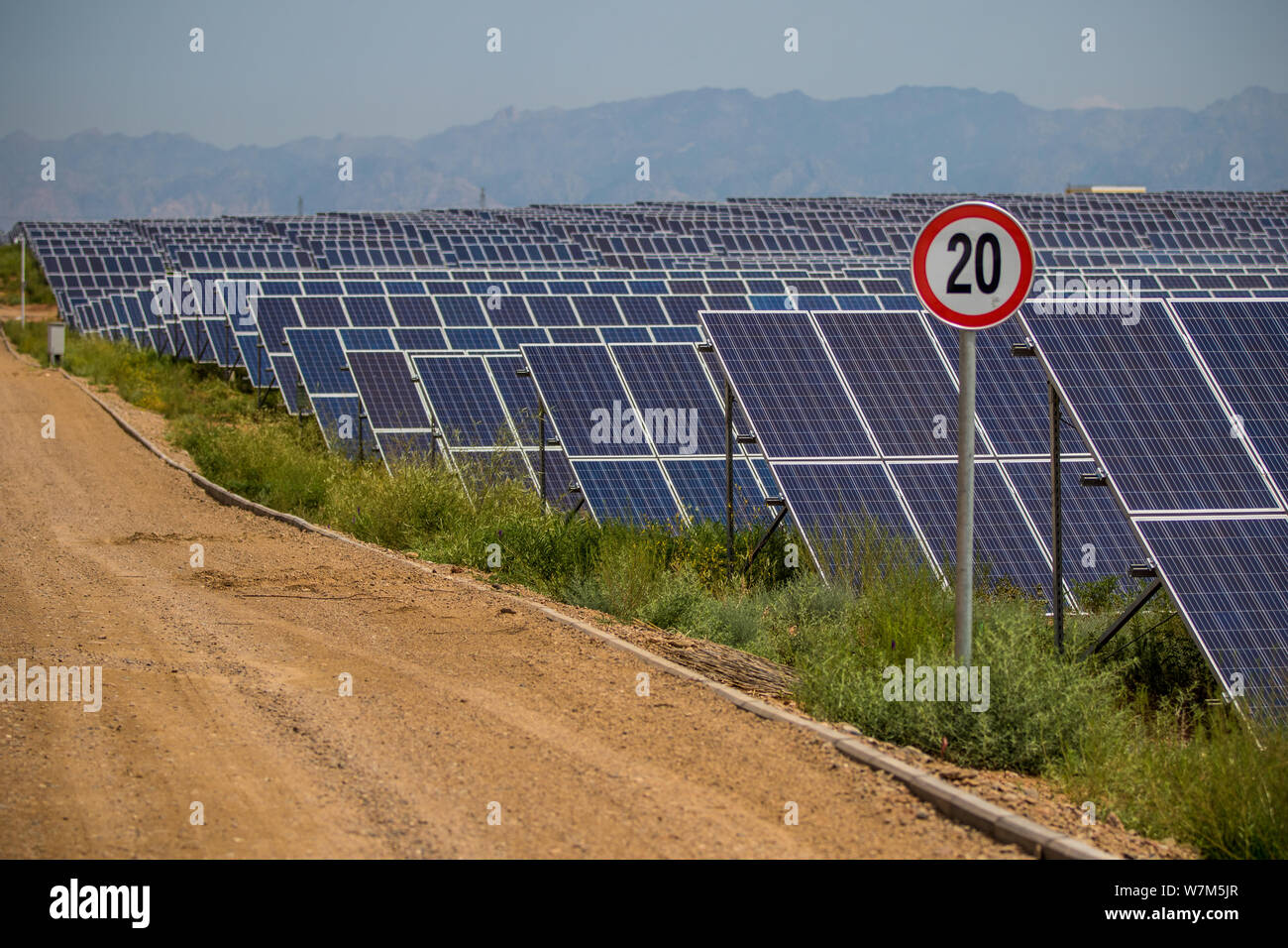Solar panels are installed at a photovoltaic (PV) power plant of Elion ...