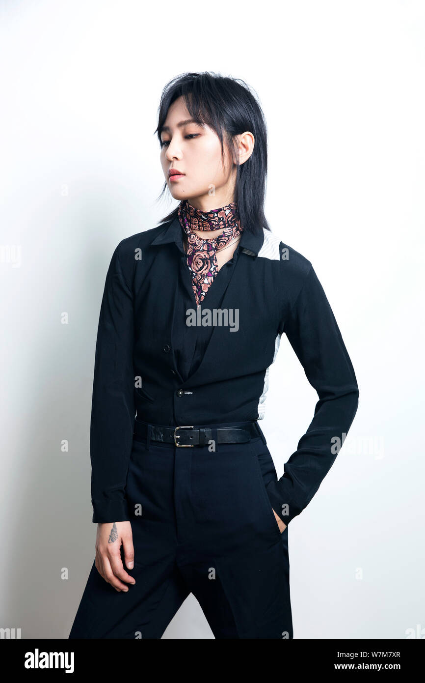 Chinese singer Zhou Bichang poses for portrait photos during an ...