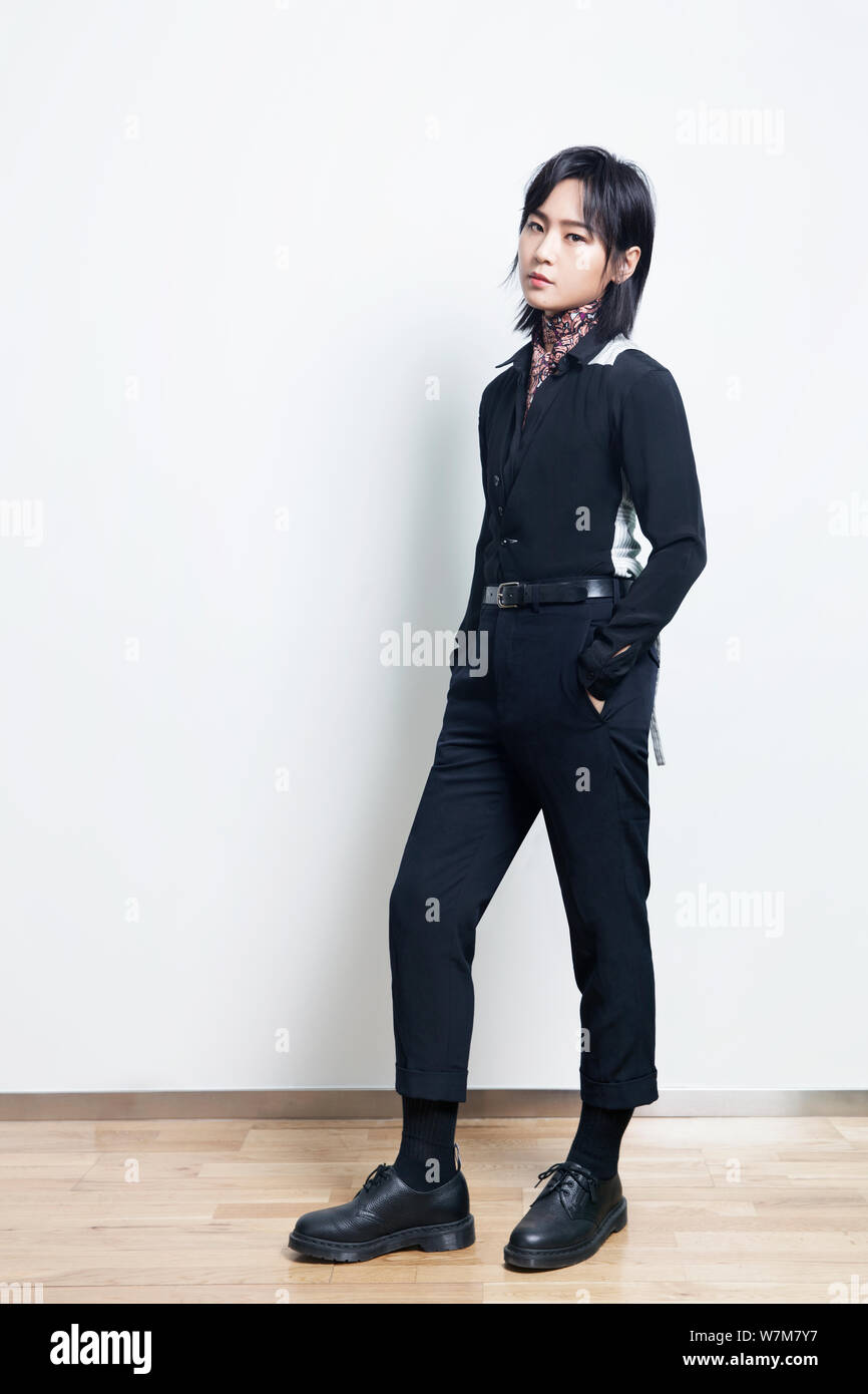 Chinese singer Zhou Bichang poses for portrait photos during an ...