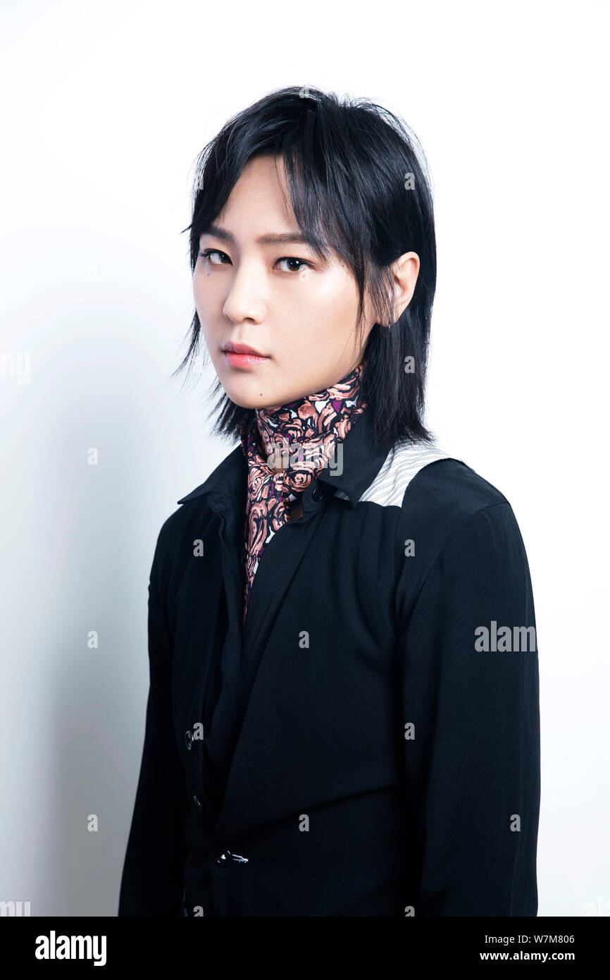 Chinese singer Zhou Bichang poses for portrait photos during an ...