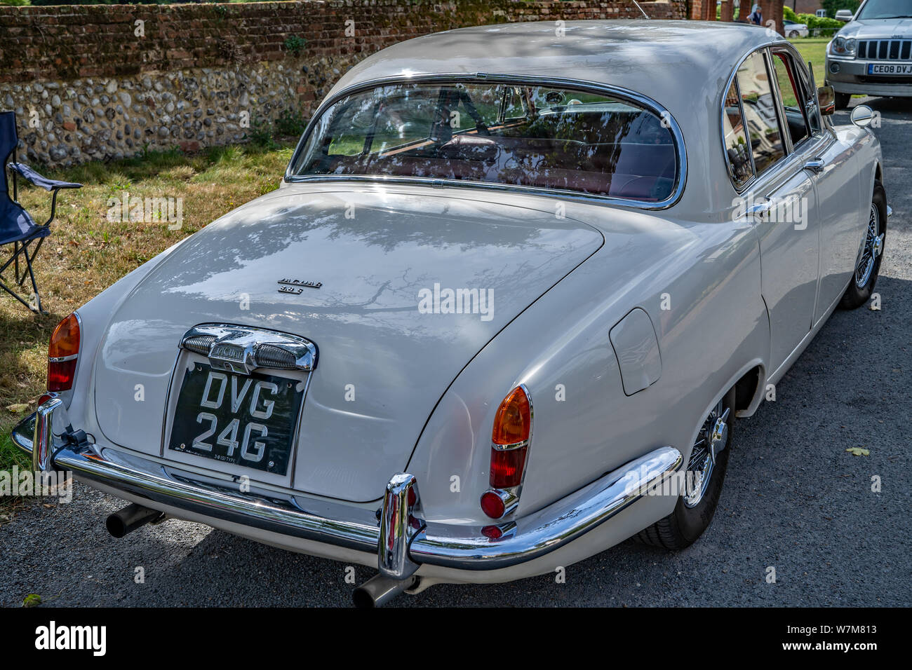 A view of the rear end of a vintage Jaguar 3000 car parked up in the ...