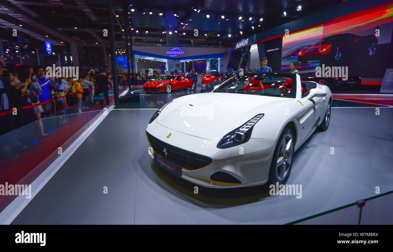 --FILE--Visitors crowd the stand of Ferrari during the 17th Shanghai ...
