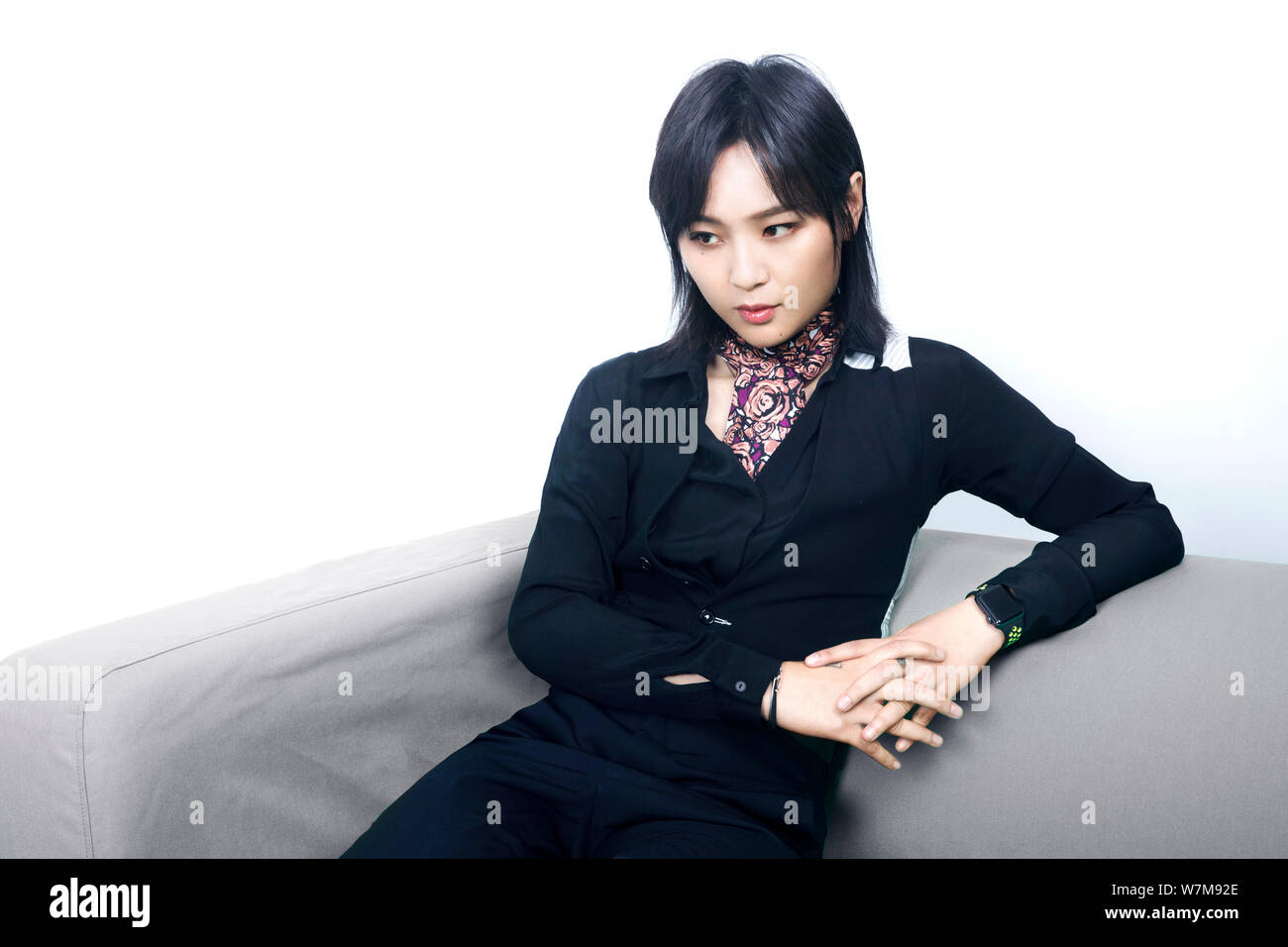 Chinese singer Zhou Bichang poses for portrait photos during an ...