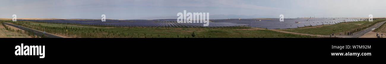 Solar panels are installed at a photovoltaic (PV) power plant of Elion ...