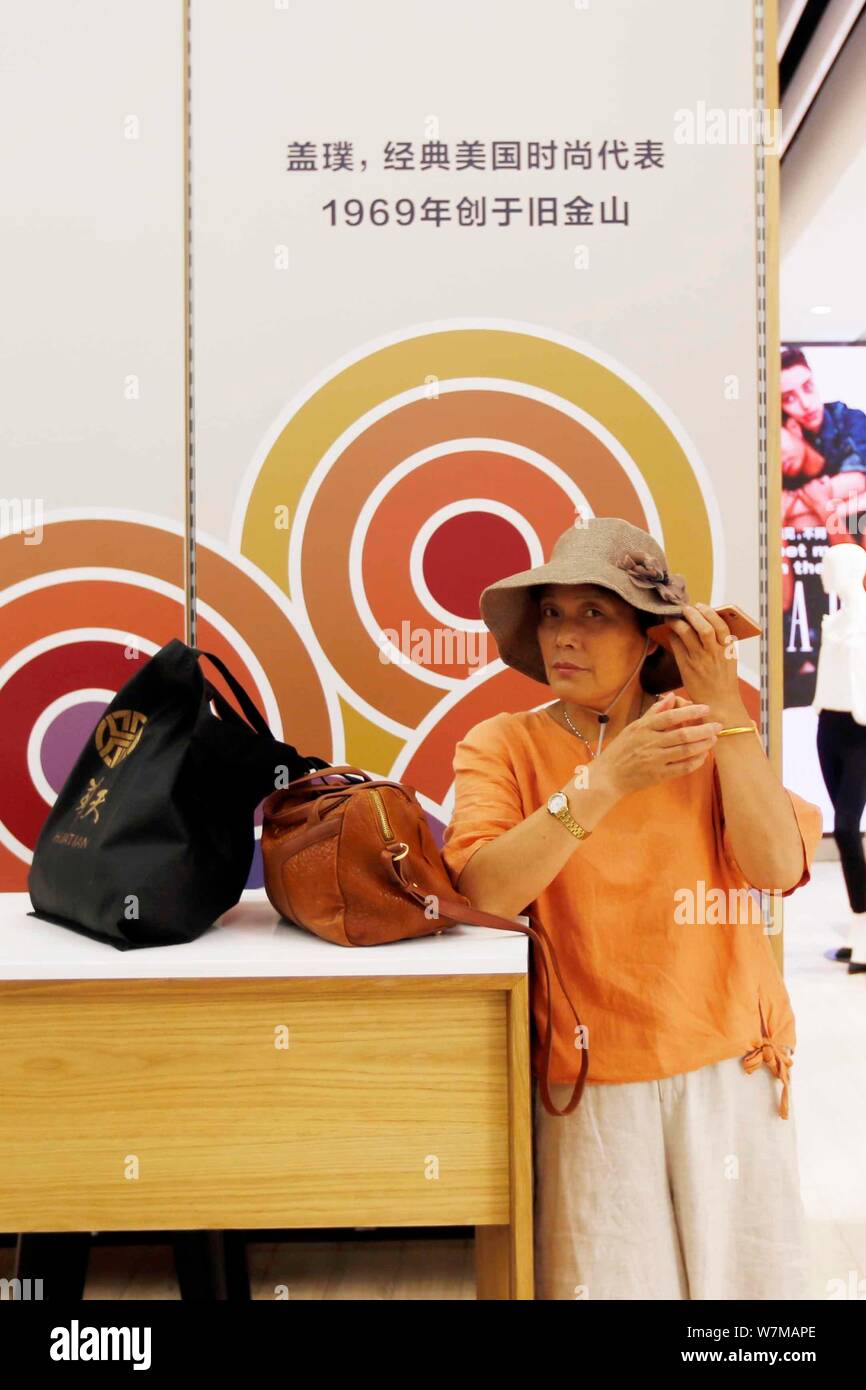 A customer shops at the China's largest Gap flagship store on the West ...