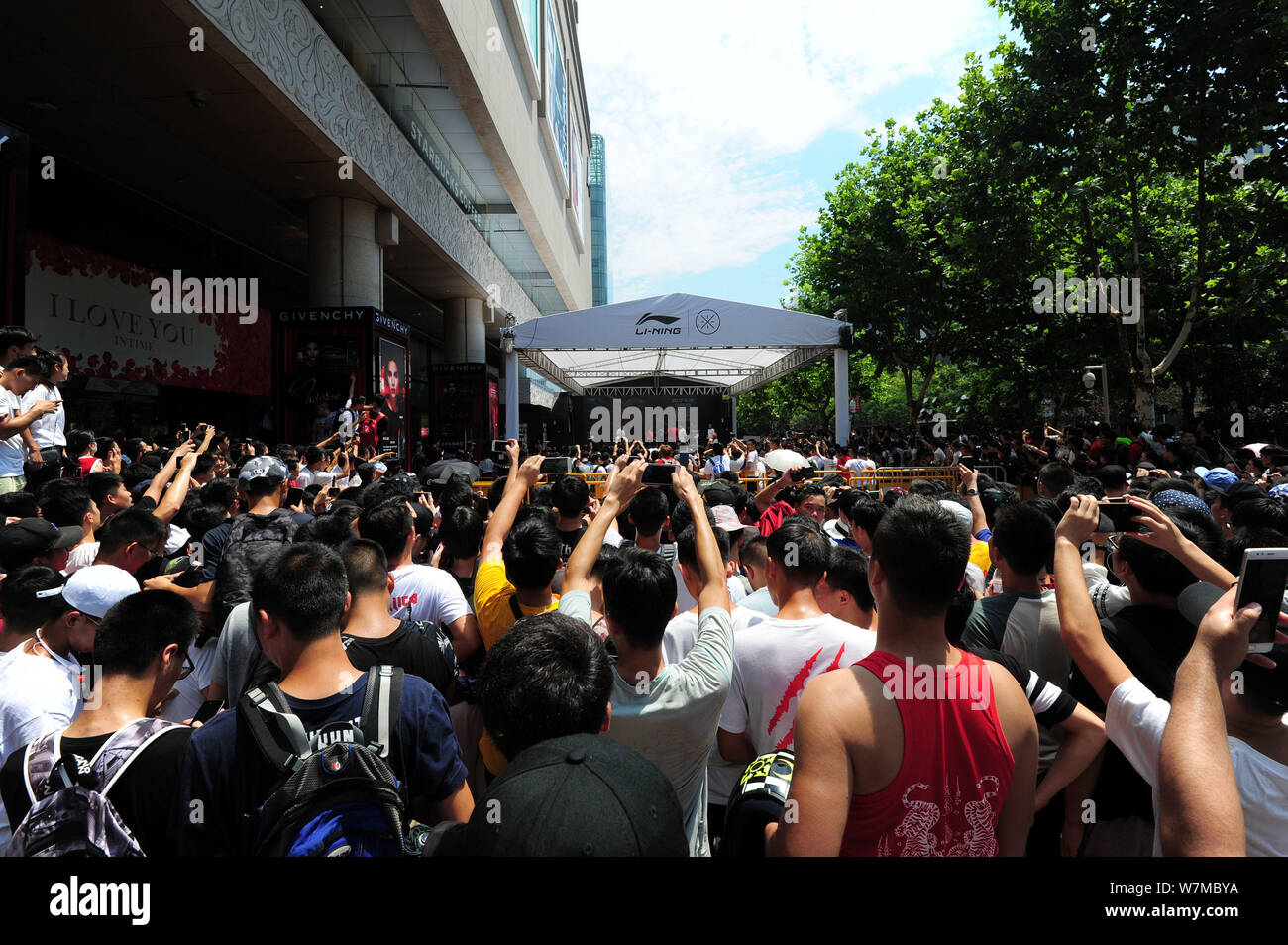 Chinese fans are pictured at a fan meeting event during NBA star Dwyane ...