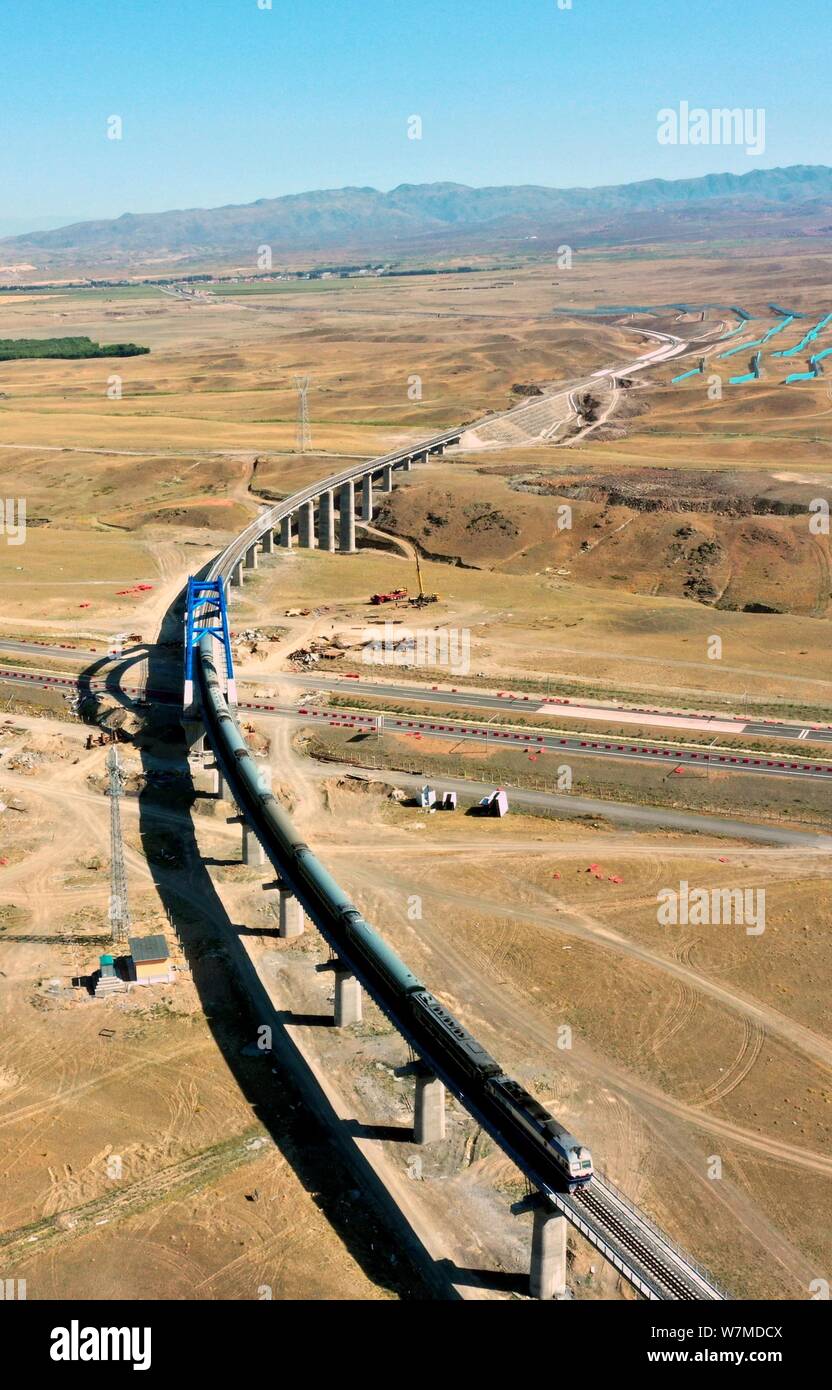 Tacheng, China. 06th Aug, 2019. The train cross wilderness and connect ...