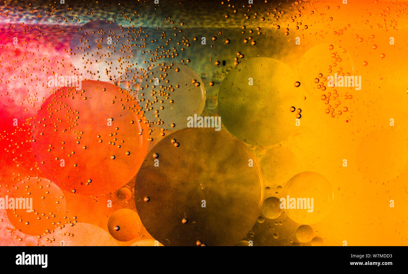 Oil bubbles inside water base form patterns Stock Photo - Alamy