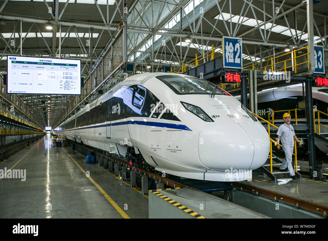 A CRH5G (China Railway High-speed) bullet train is pictured at the maintenance station on the Xi ...
