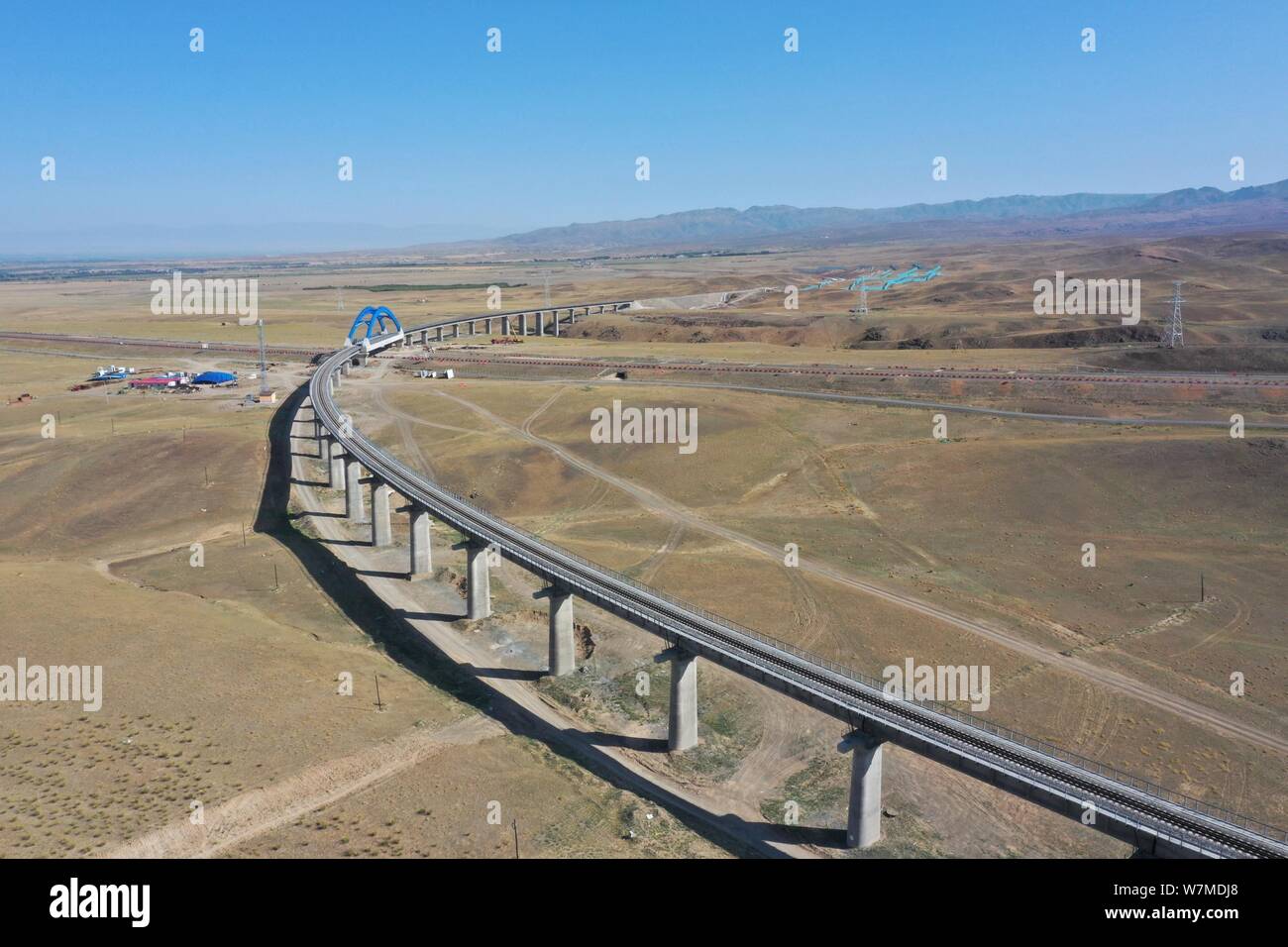 Tacheng, China. 06th Aug, 2019. The train cross wilderness and connect ...