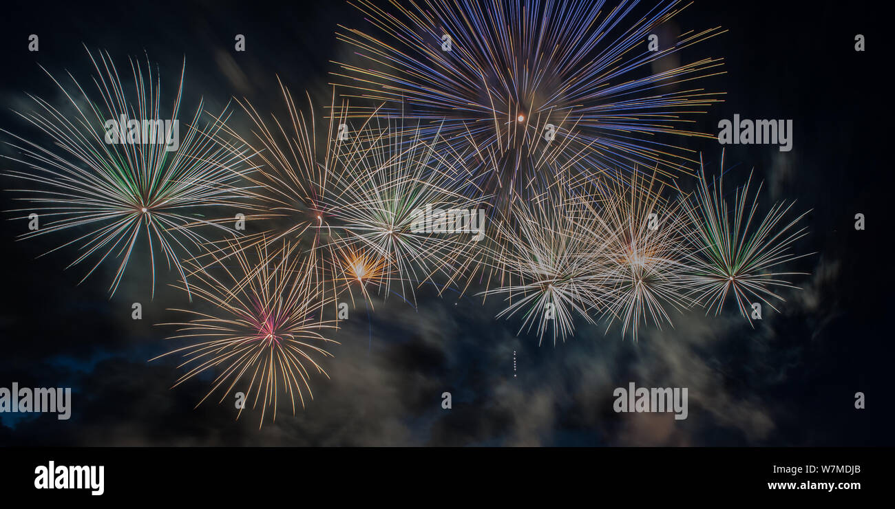 Colorful fireworks close up, fireworks explosion in dark sky. Ventspils ...