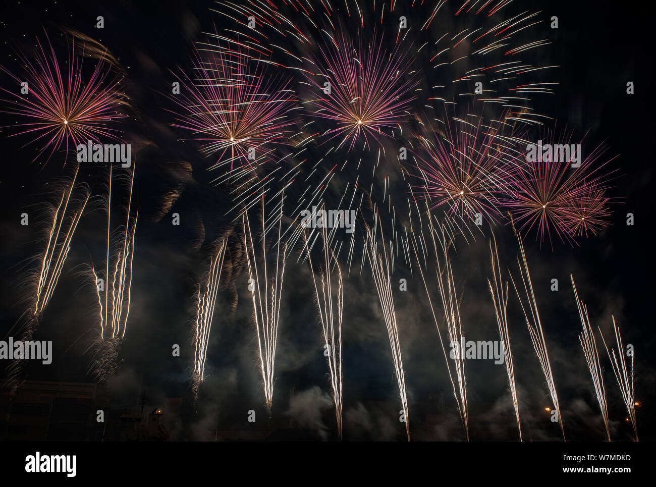 Colorful fireworks close up, fireworks explosion in dark sky. Ventspils ...
