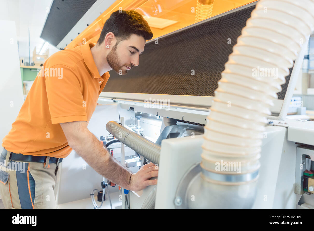 Adjusting machine hi-res stock photography and images - Alamy