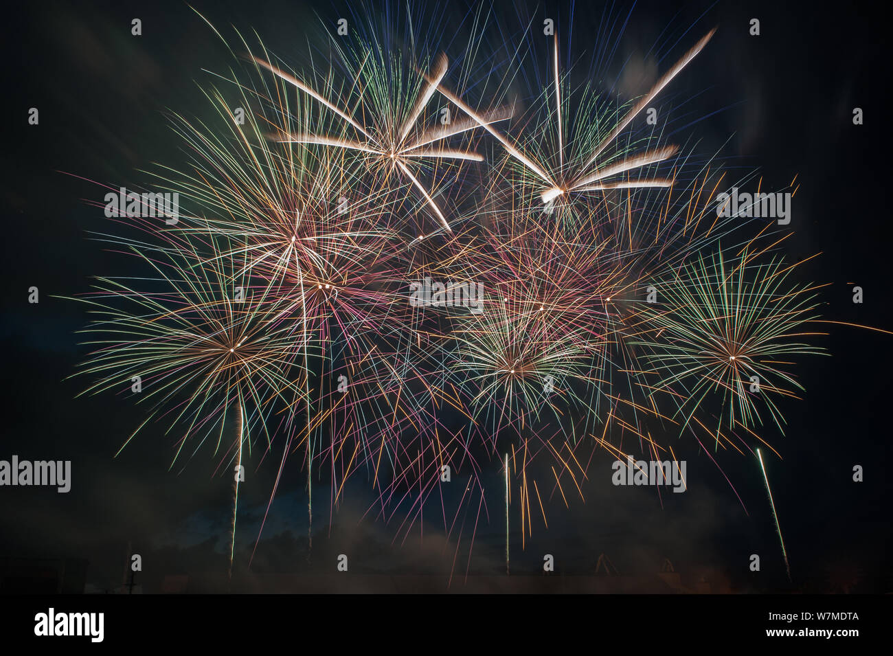 Colorful fireworks close up, fireworks explosion in dark sky. Ventspils ...