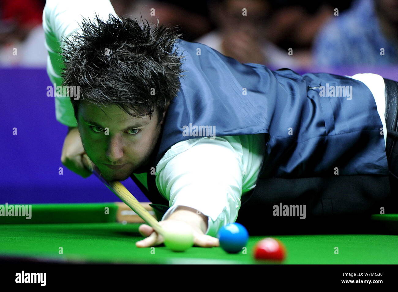 Kurt Dunham of Australia plays a shot to England in a Group C match during the 2017 Snooker ...