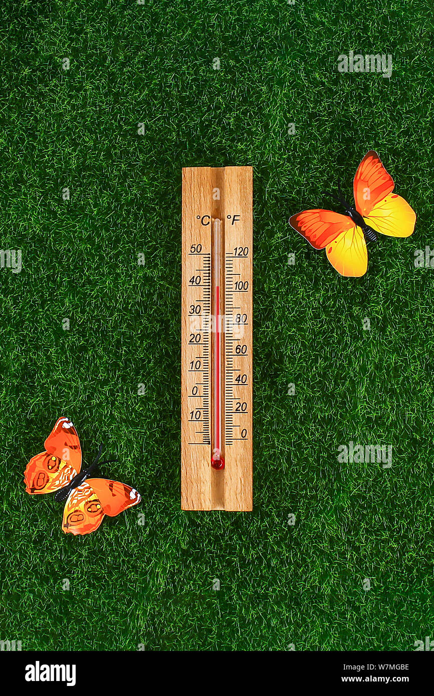 Thermometer displaying high 40 degree hot temperatures in sun summer ...