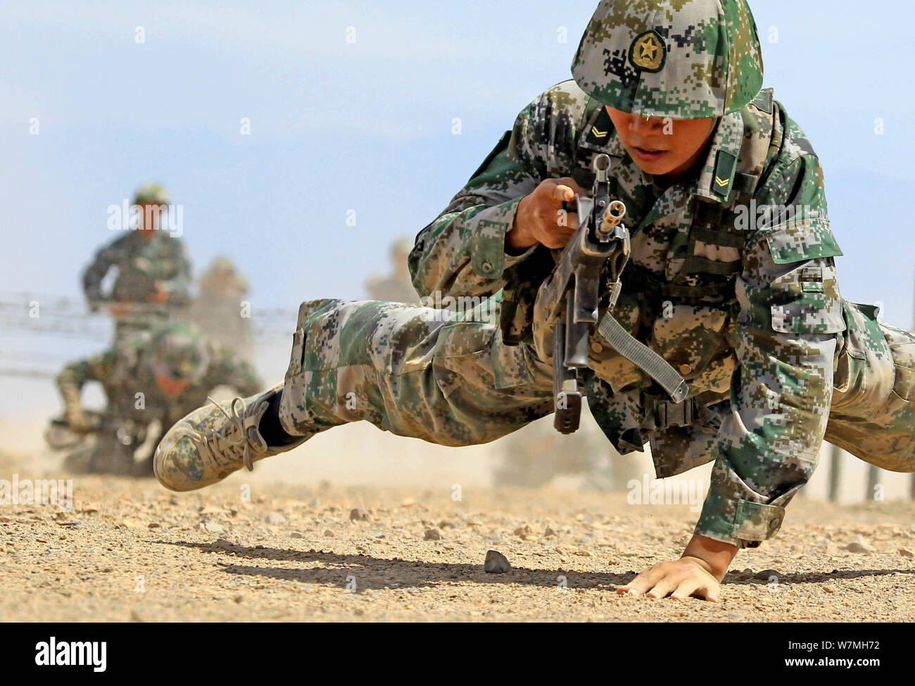 A Chinese soldier of the PLA (People's Liberation Army) takes part in a ...