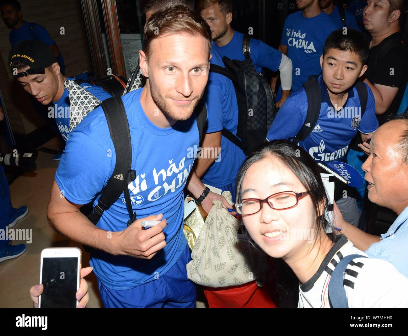 German football player Benedikt Howedes of FC Schalke 04, left, poses ...