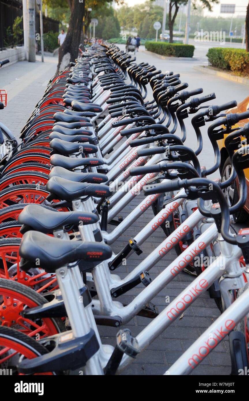 --FILE--Bicycles of Chinese bike sharing service Mobike are lined up on ...