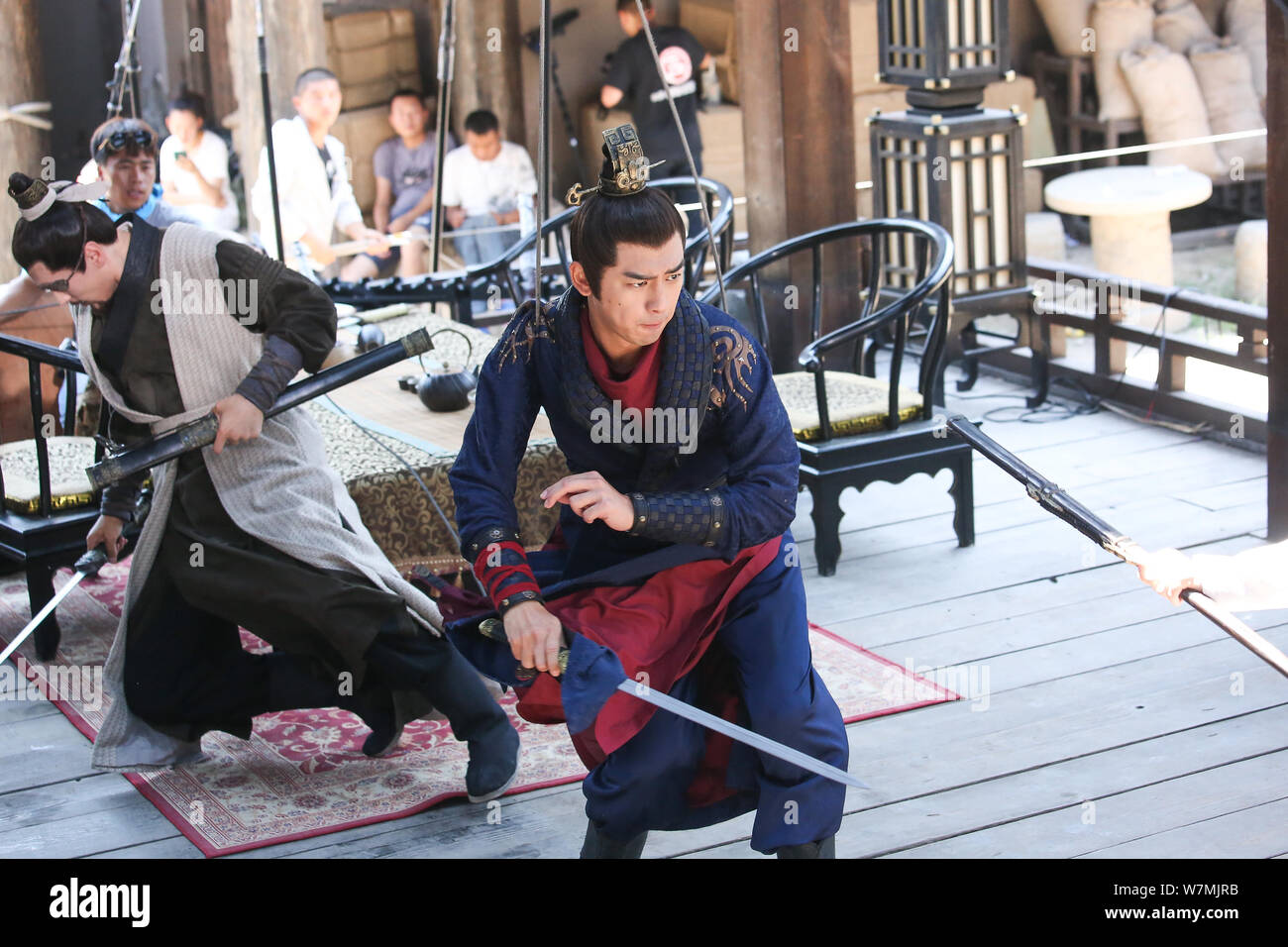 Taiwanese actor Chen Bolin is pictured during a filming session on set ...