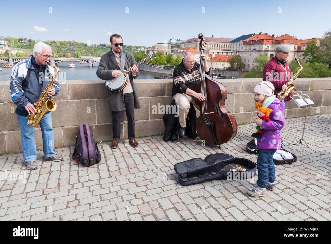 Prague, Czech Republic - April 30, 2017: Band of street musicians plays ...