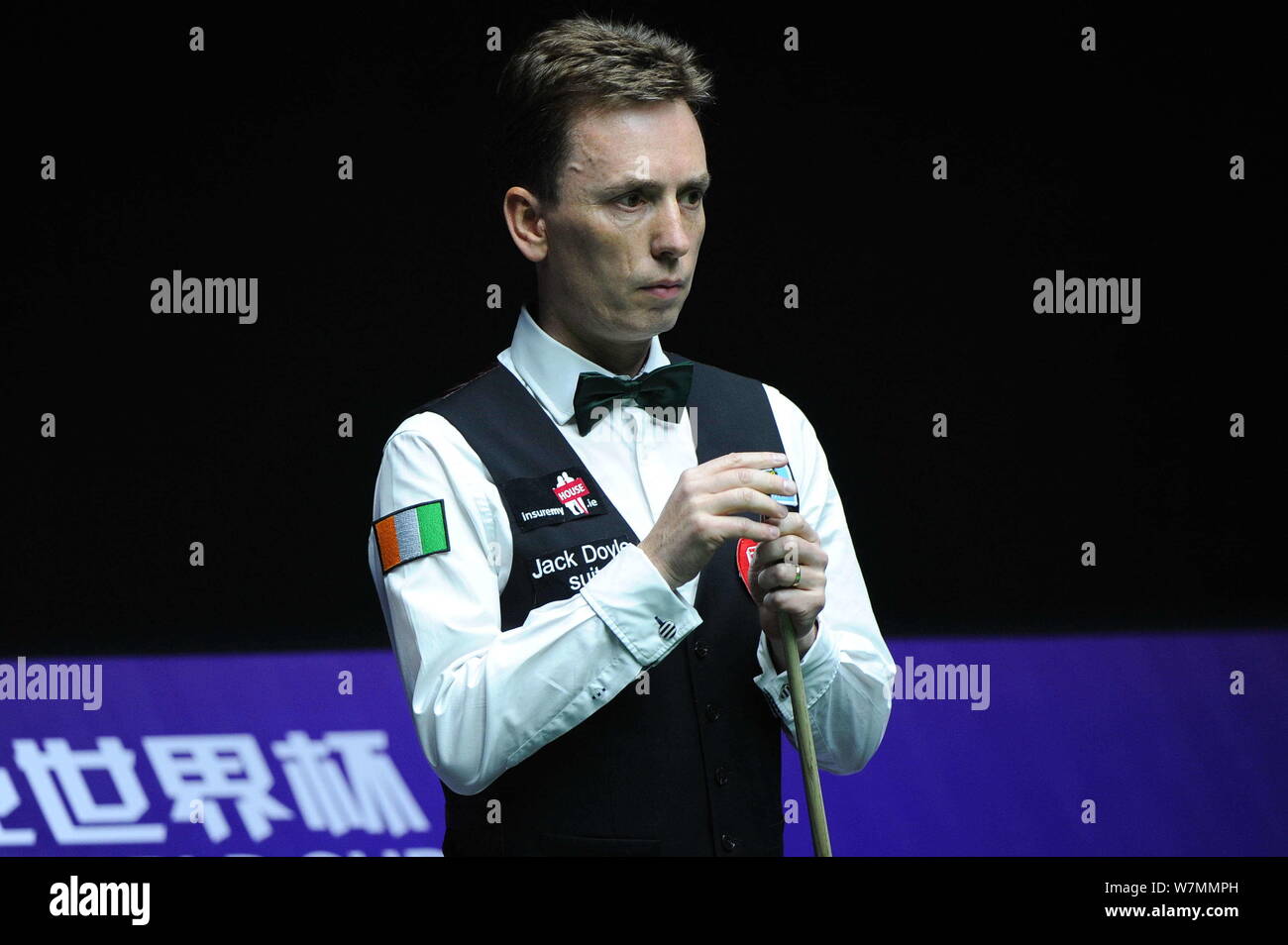 Ken Doherty of Ireland chalks his cue as he considers a shot to China A ...